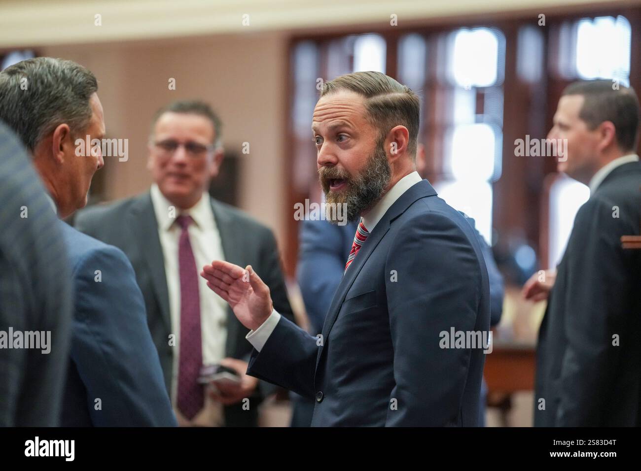 Speaker DUSTIN BURROWS , R-Lubbock, talks to Rep. Rafael Anchia, D ...