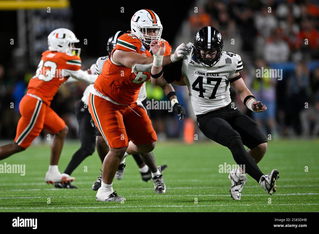 Miami offensive lineman Francis Mauigoa (61) blocks Iowa State ...