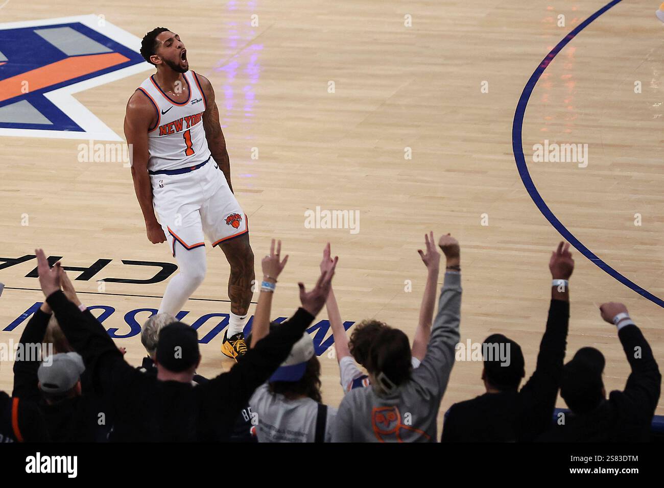 New York Knicks' Cameron Payne (1) celebrates with fans after a 3-point ...