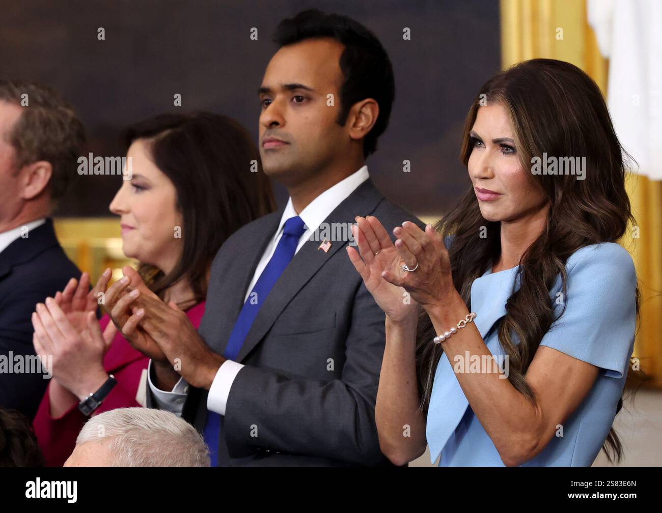 Vivek Ramaswamy and Kristi Noem applaud during U.S. President Donald ...