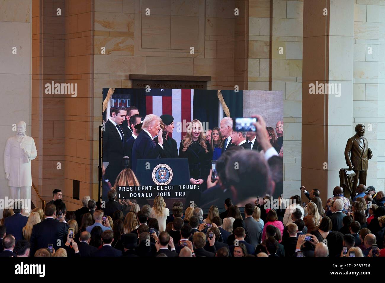 Guests watch as John Roberts, chief justice of the US Supreme Court ...
