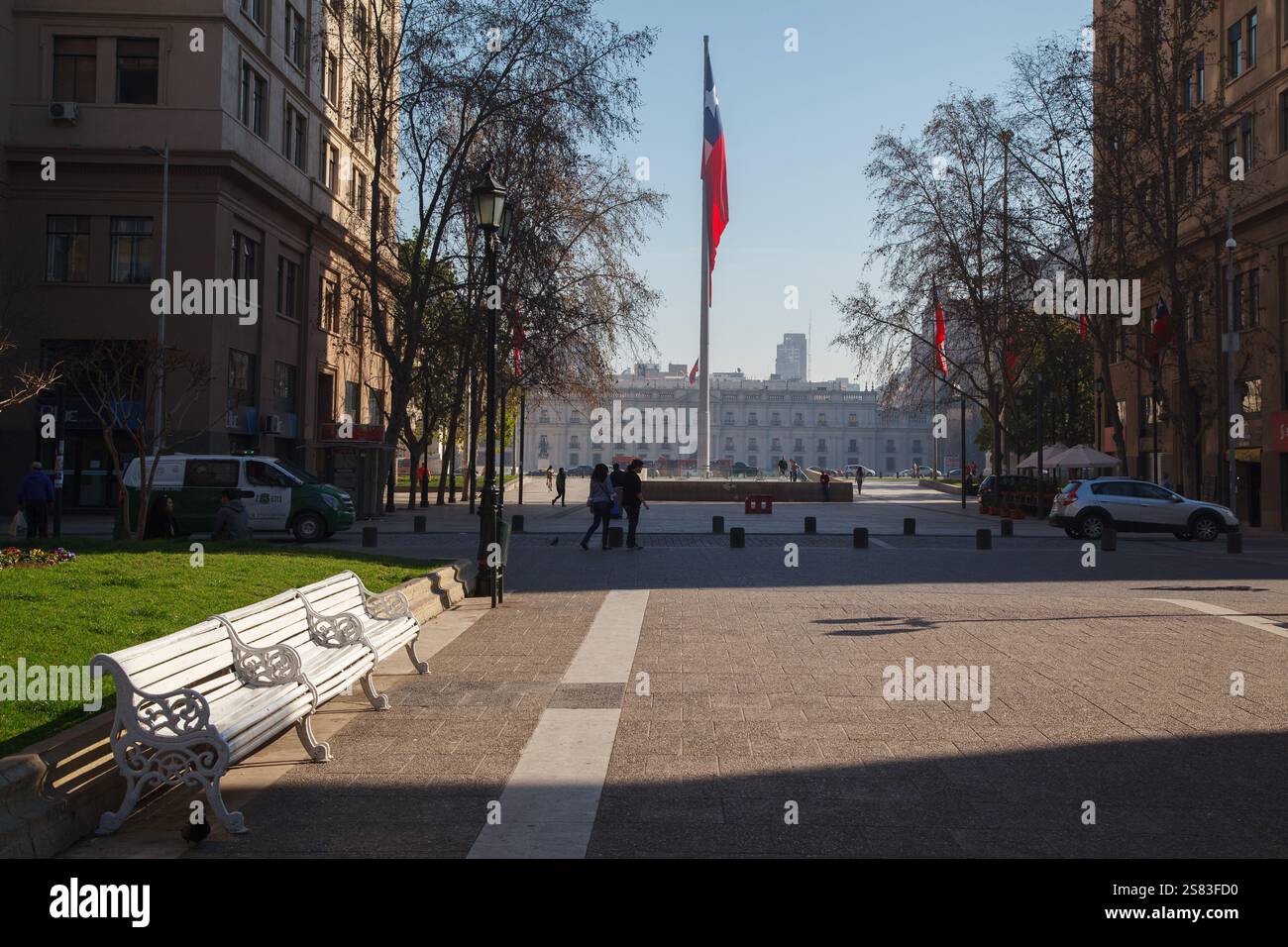 The Palacio de la Moneda, the chilean flag and the elegant buildings ...