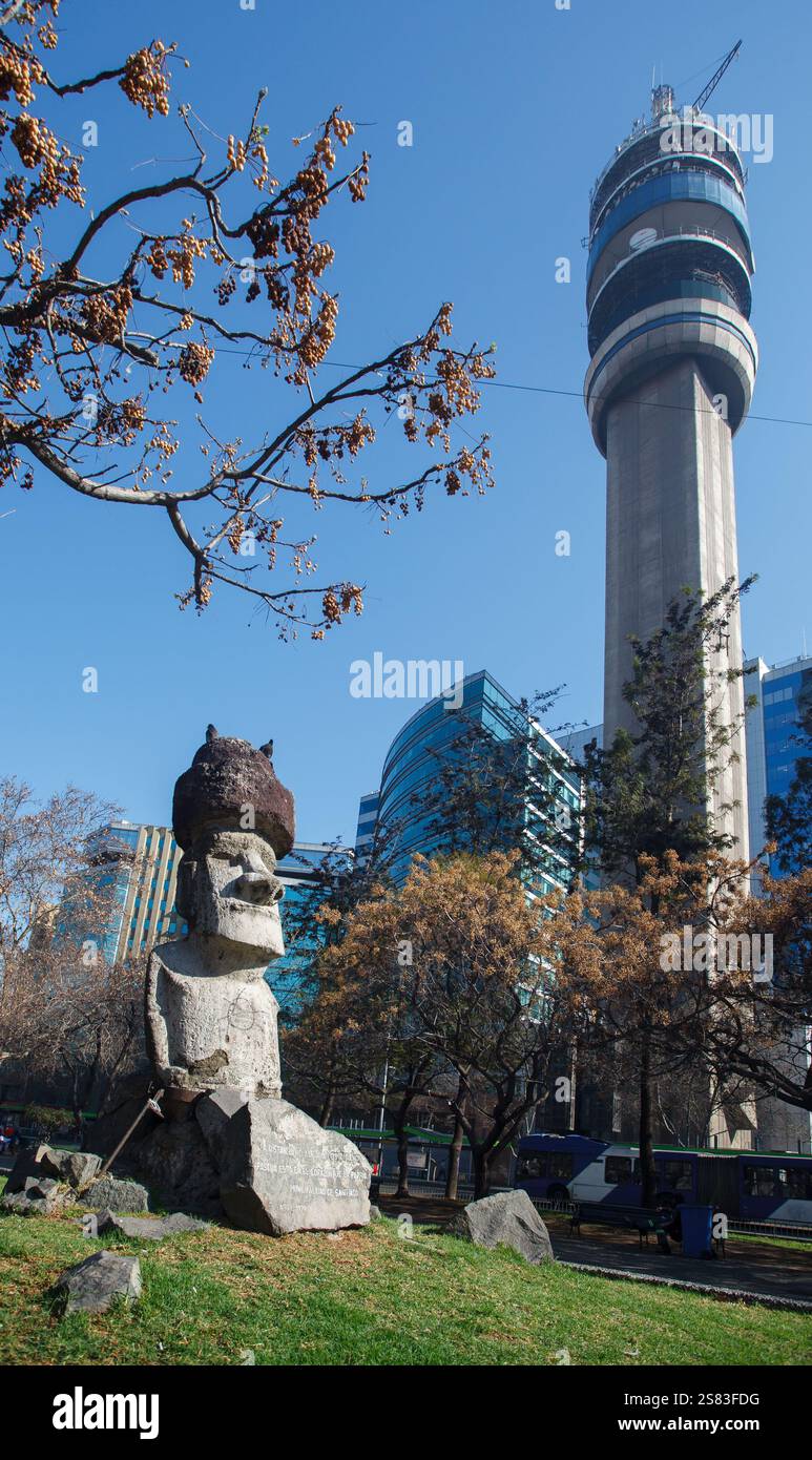 A Moai Rapa Nui statue and ENTEL Communications tower in downtown ...