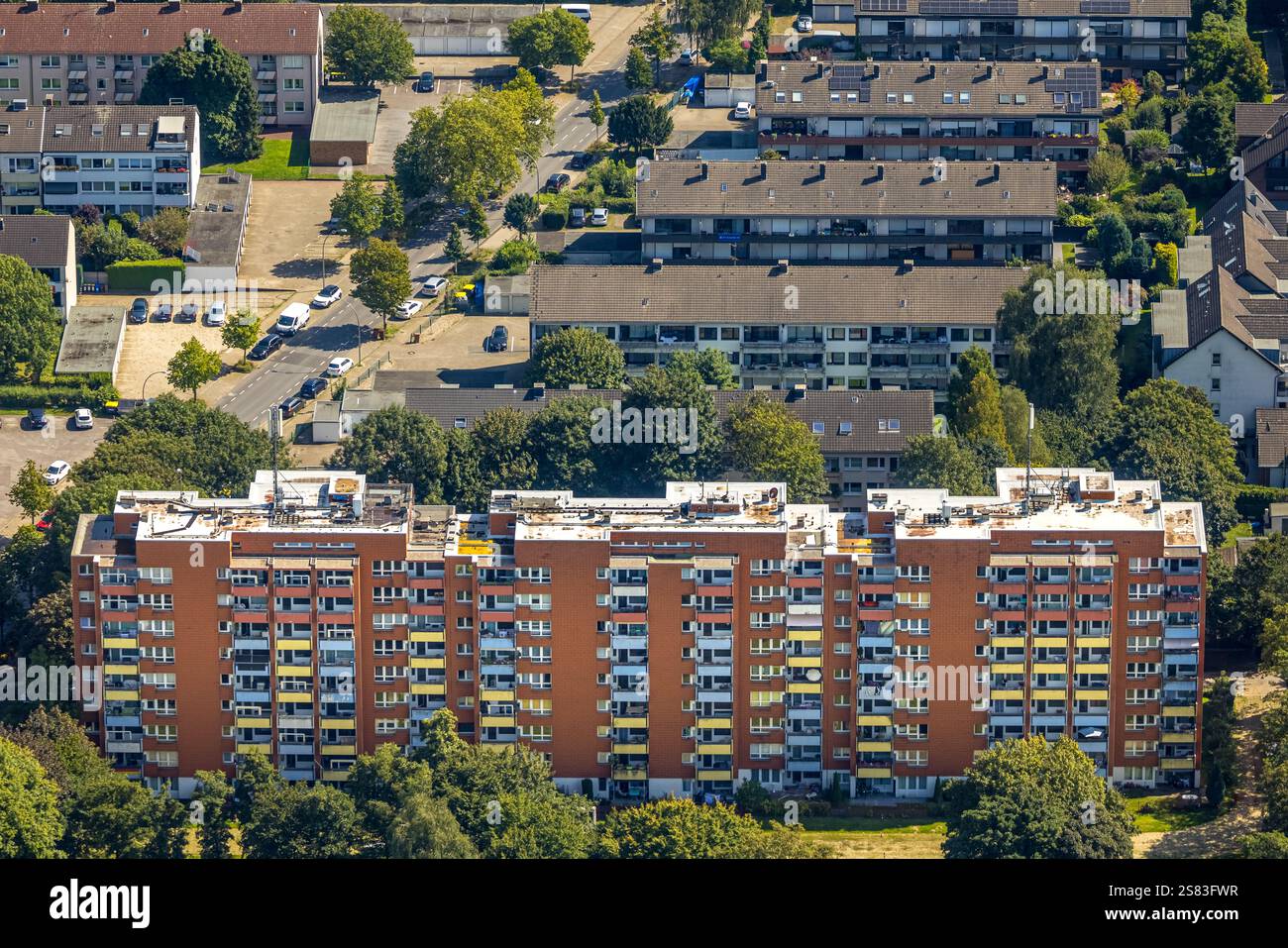 Aerial view, housing estate high-rise apartment block with colorful ...