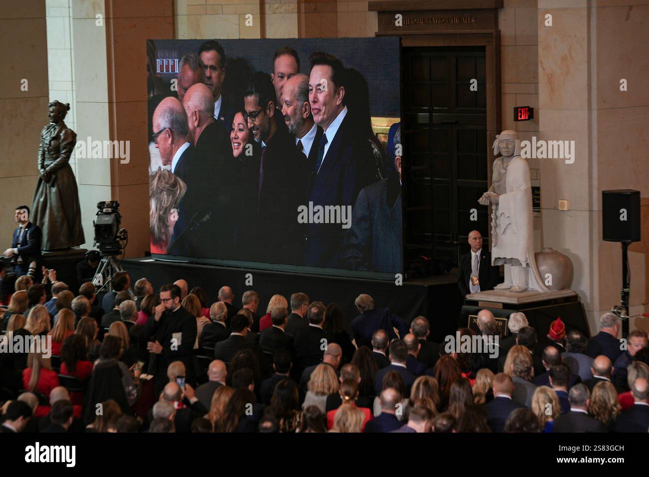Attendees watch a livestream in Emancipation Hall showing Google CEO ...