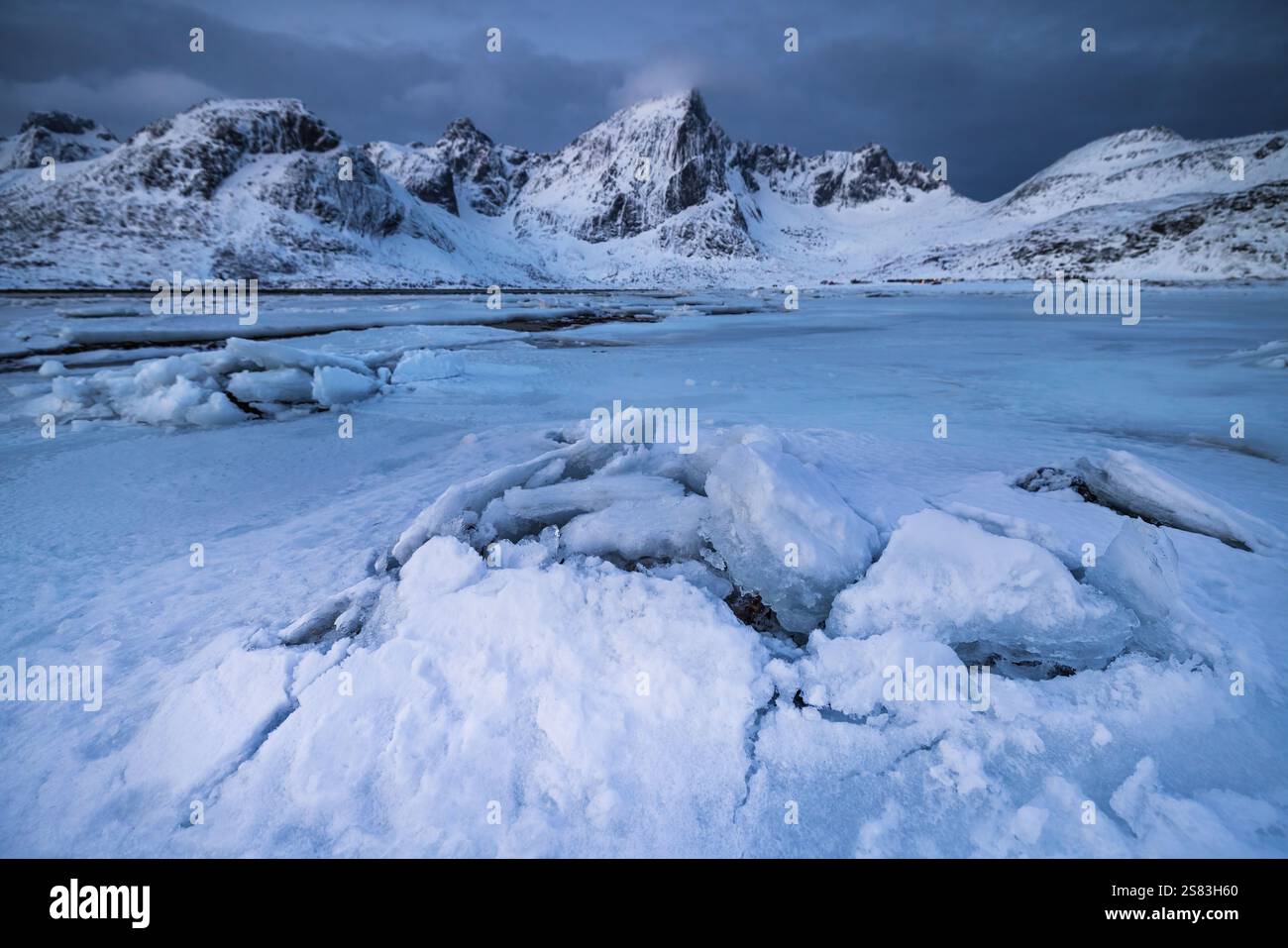 Scenic winter seascape of sea beach and fjords frozen rocky norge coast ...