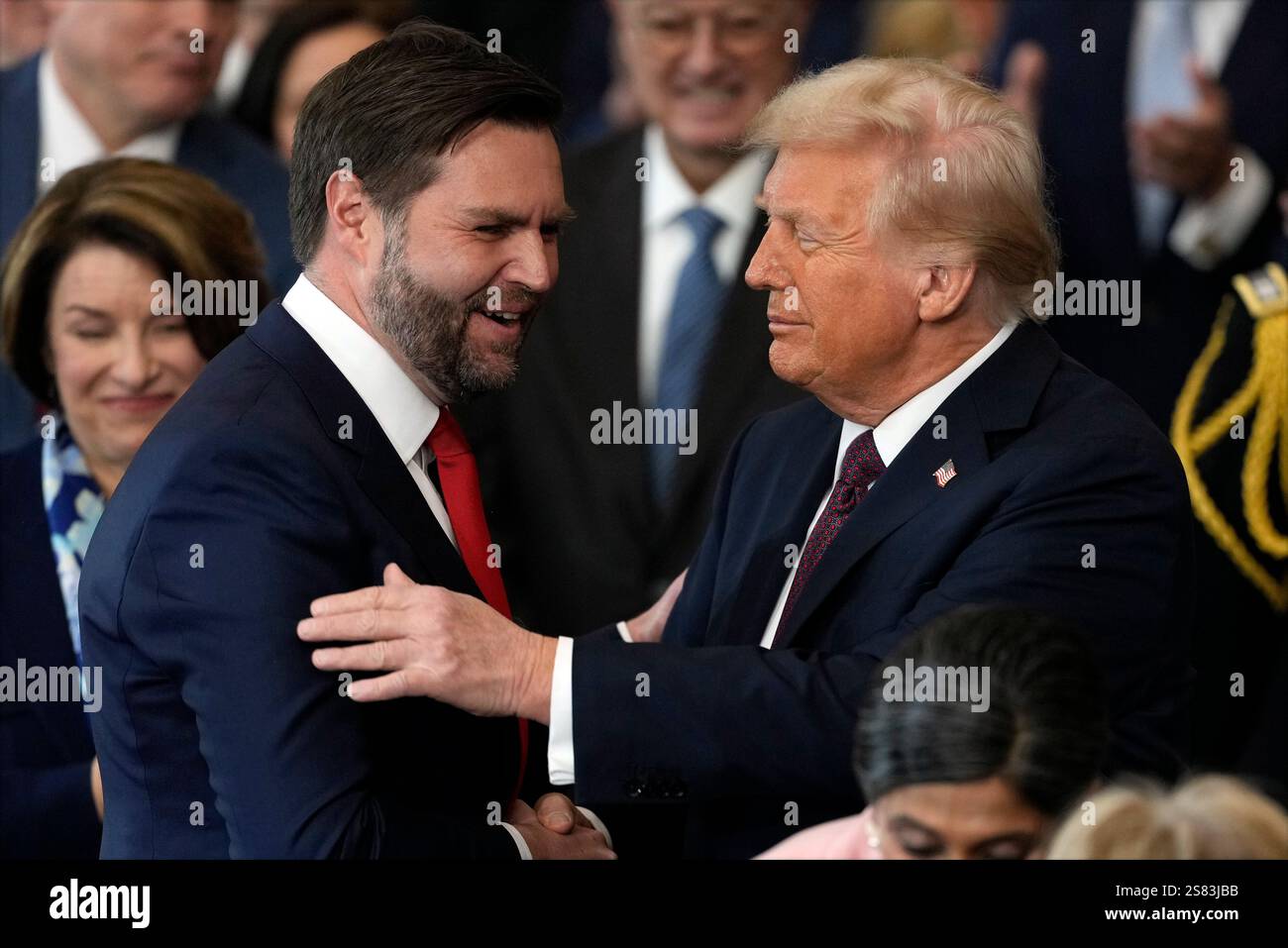 Vice President JD Vance greets President-elect Donald Trump after Vance ...