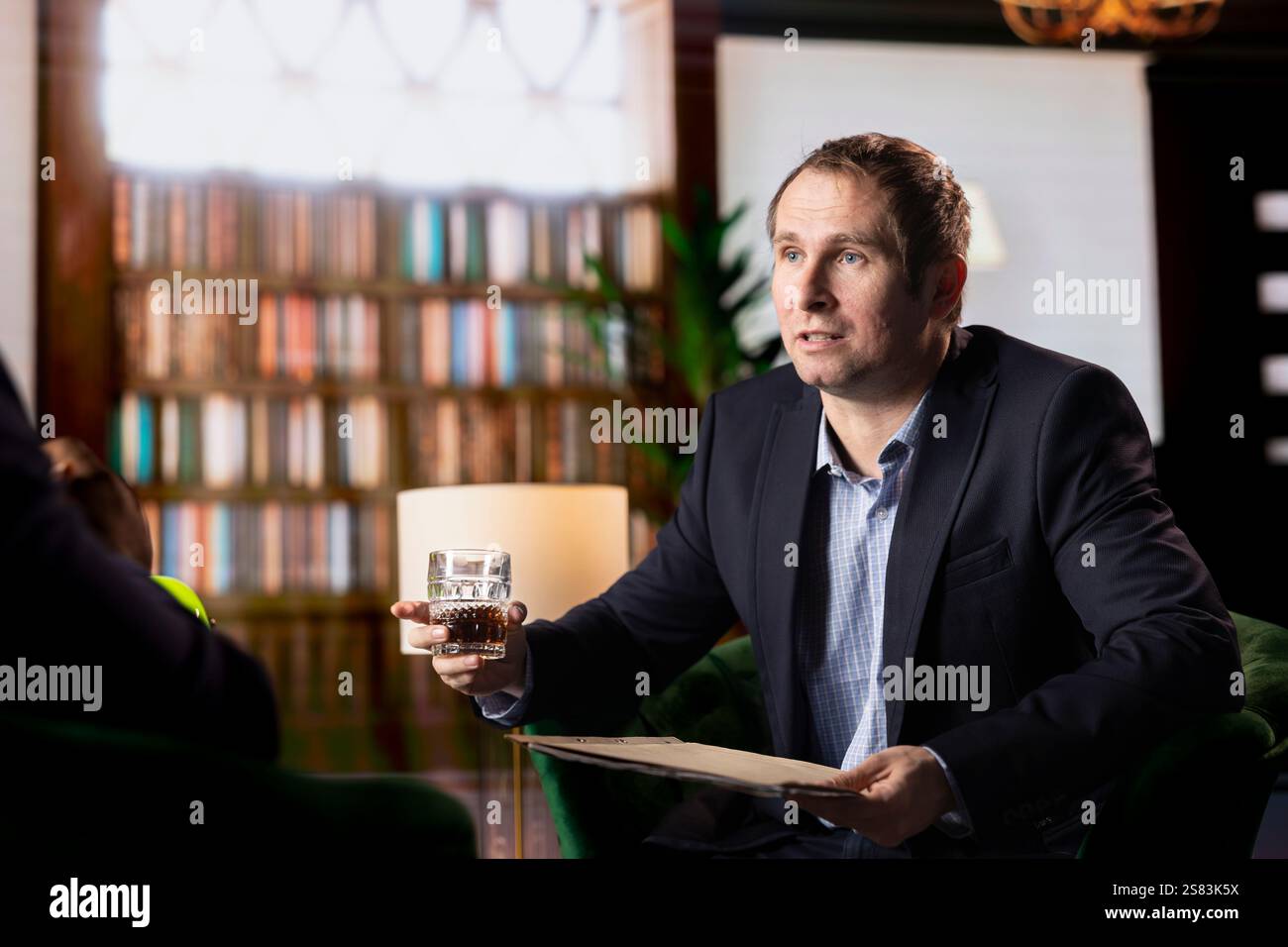 Secret service manager presenting important case files details over a ...