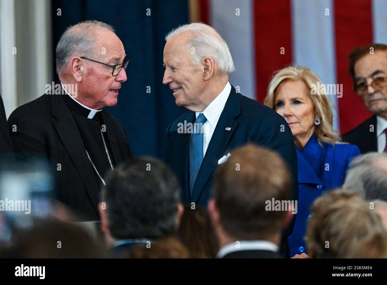 Cardinal Timothy Dolan and President Joe Biden during the inauguration ...