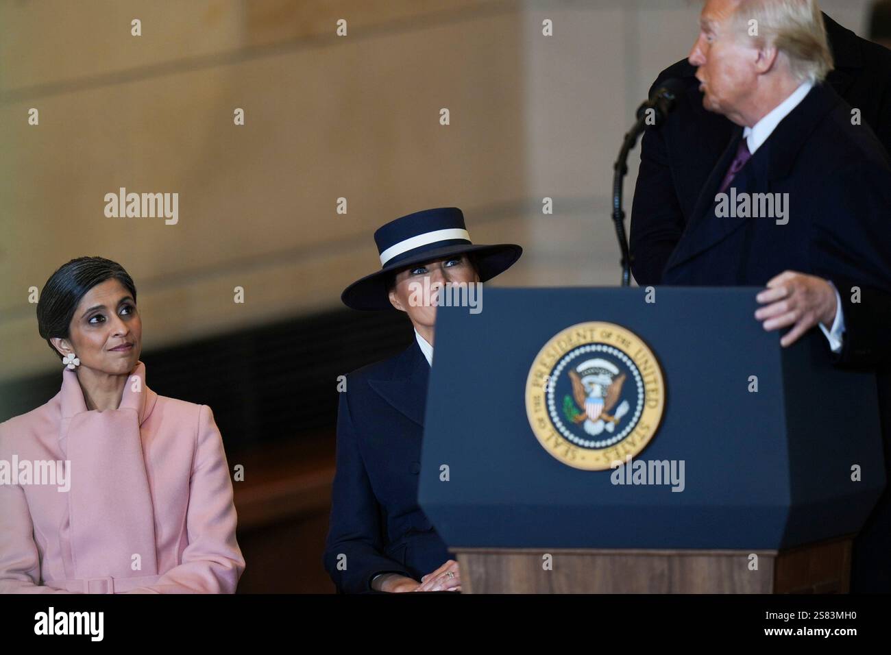 Second Lady Usha Vance and First Lady Melania Trump listen as President ...