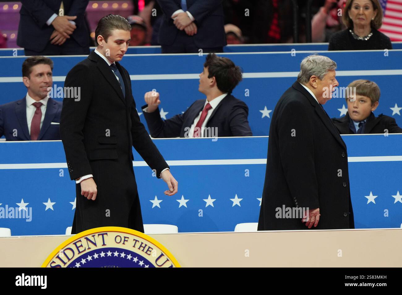 Barron Trump, left, and his grandfather Viktor Knavs arrive at an ...