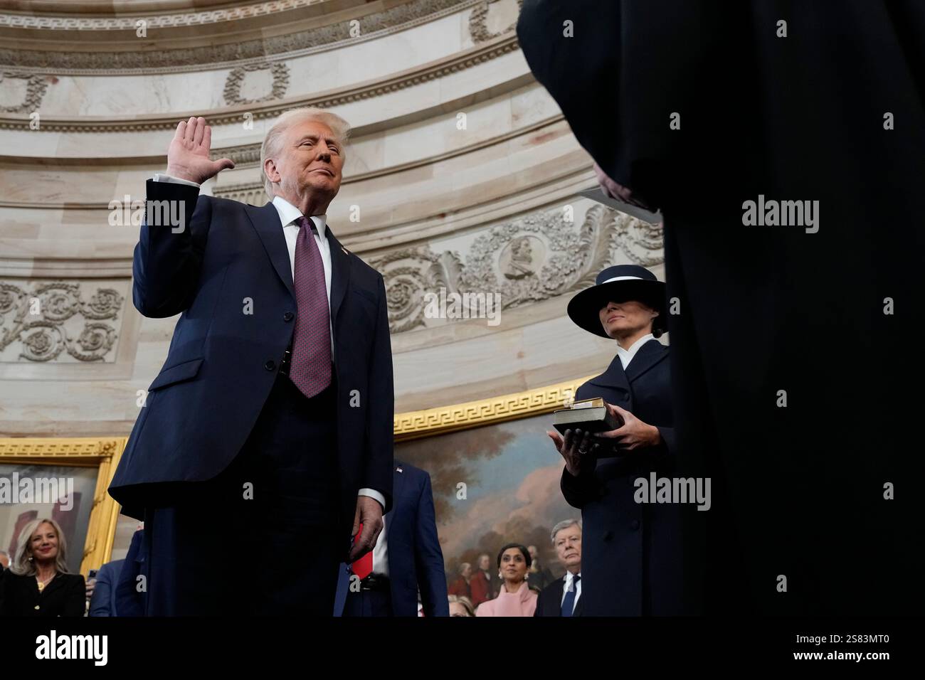 Donald Trump is sworn in as the 47th president of the United States by ...