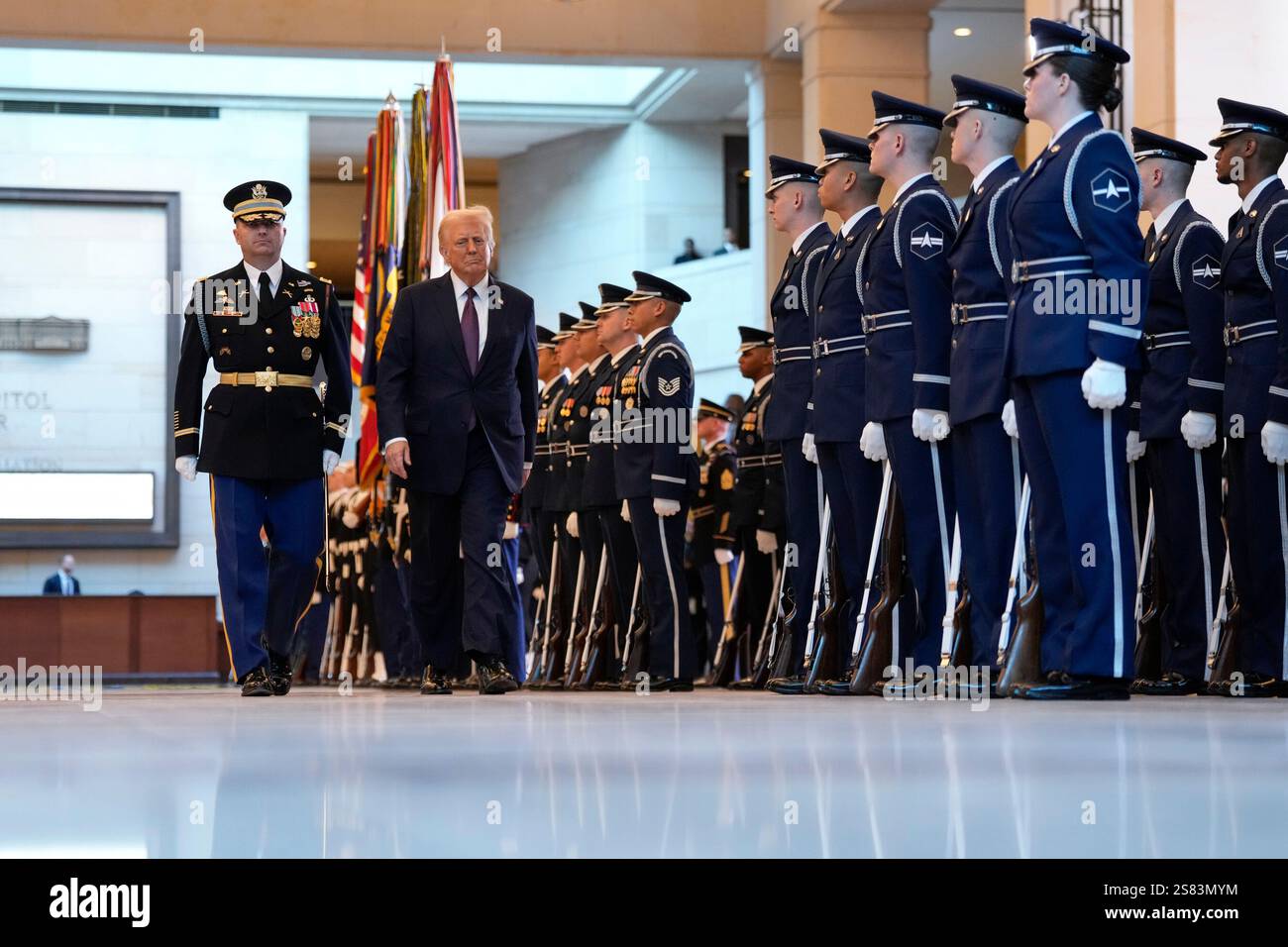 President Donald Trump reviews the troops in Emancipation Hall of the U ...
