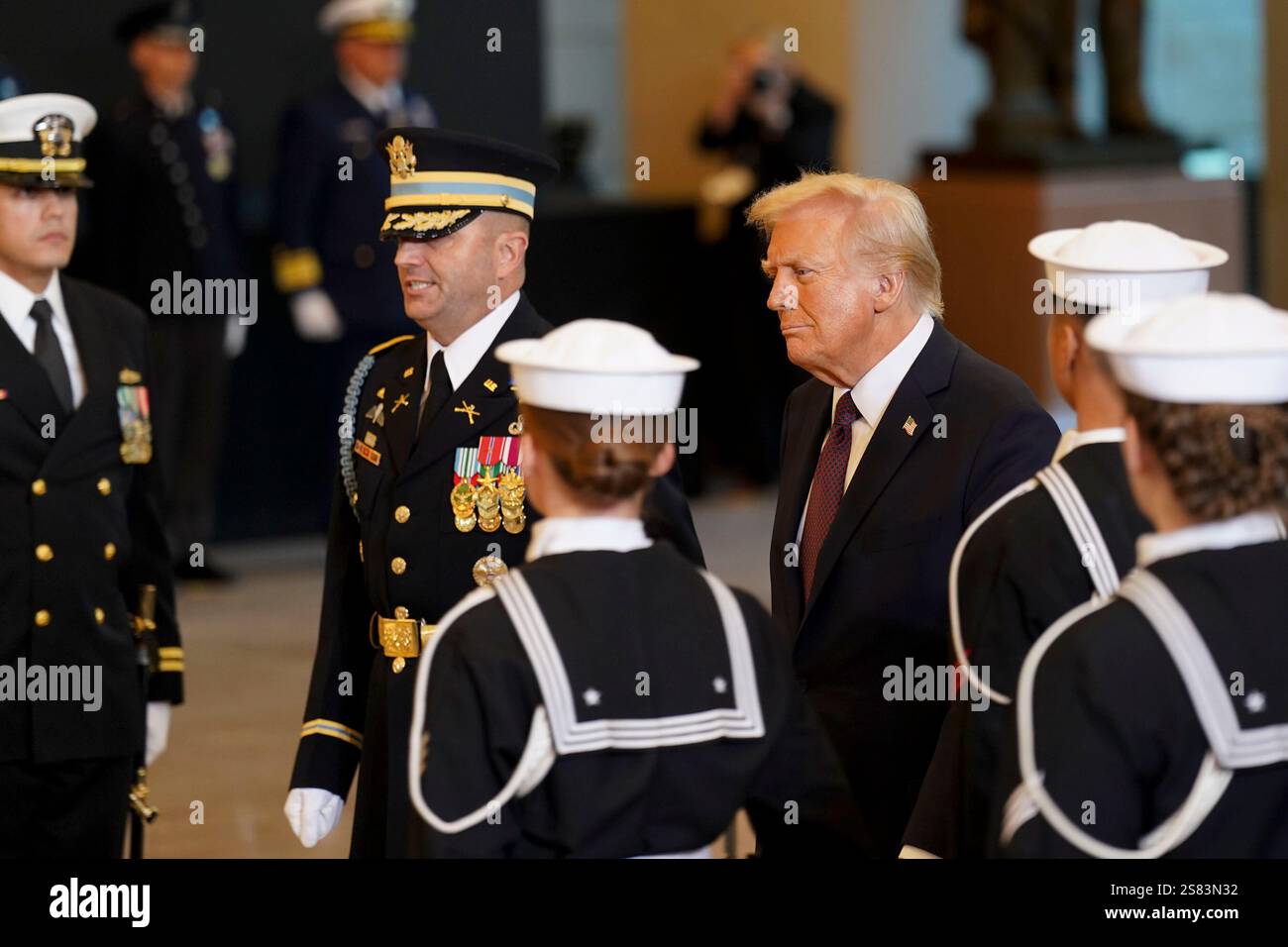 US President Donald Trump reviews the troops during the 60th ...
