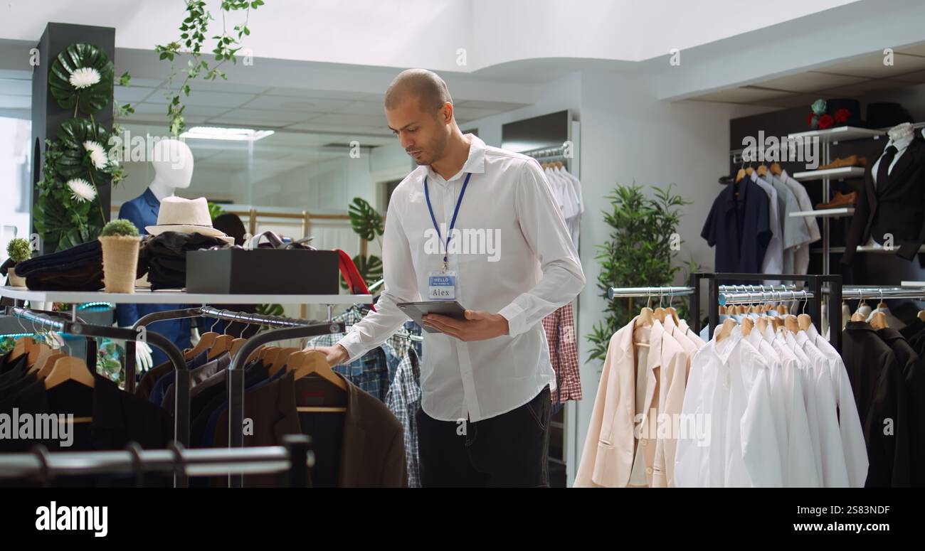 Shopping center employee organizing new hi-res stock photography and ...