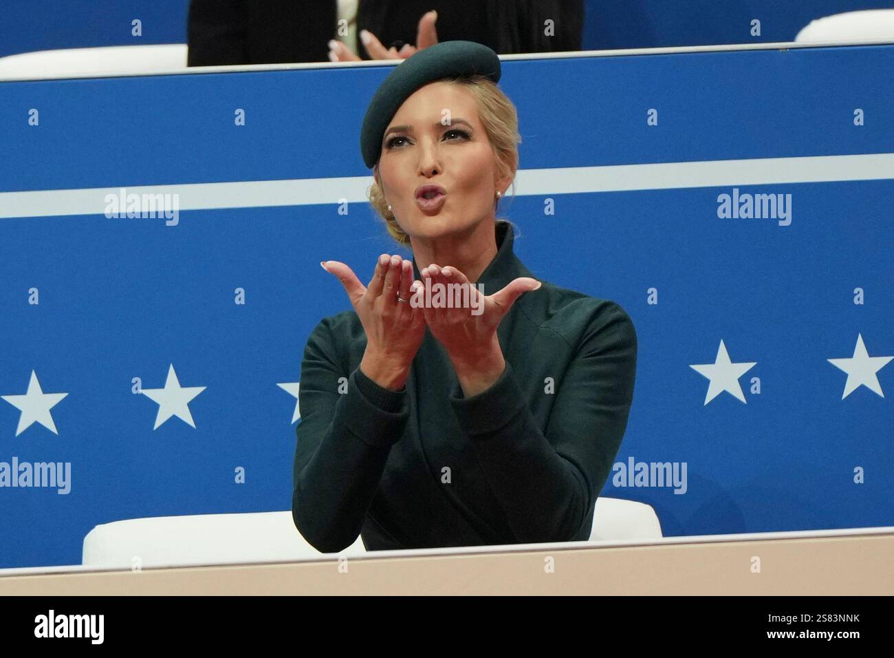 Ivanka Trump blows a kiss as she arrives at an indoor Presidential ...