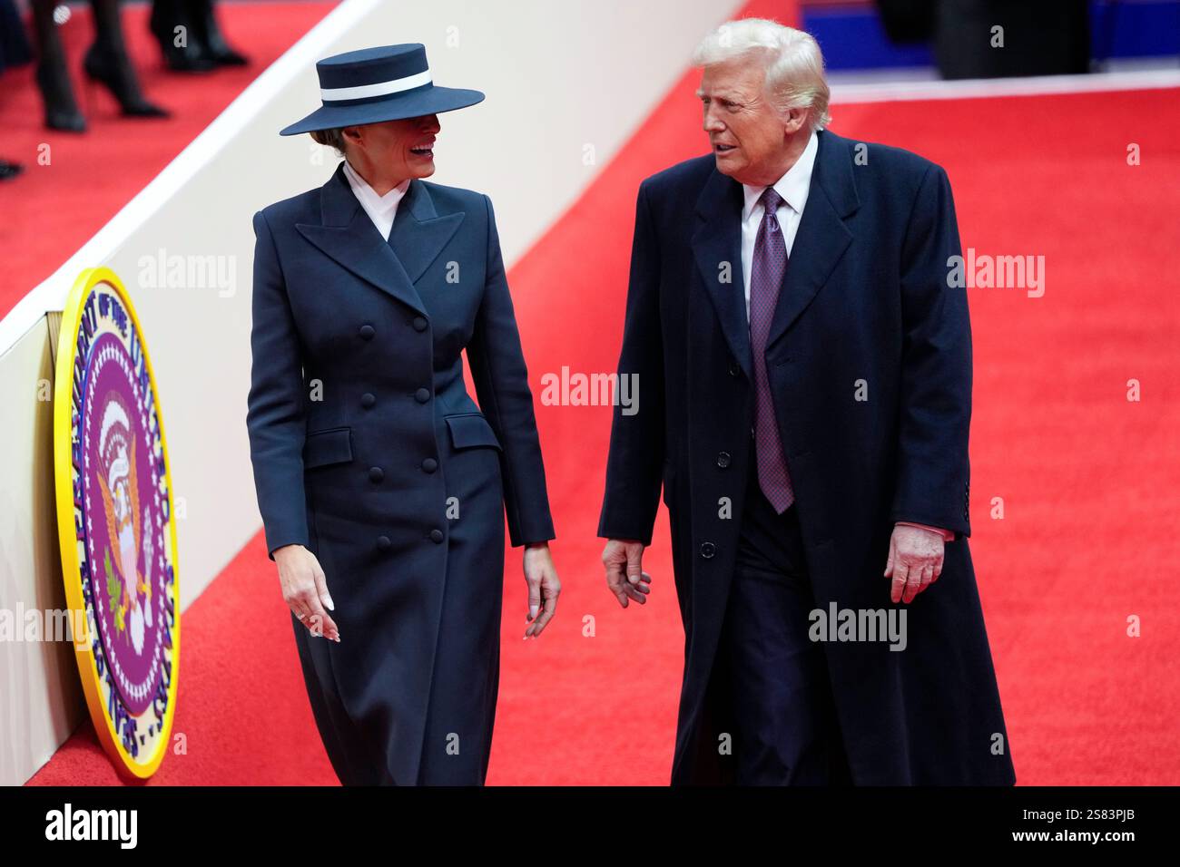 President Donald Trump and first lady Ivanka Trump, arrive at an indoor ...
