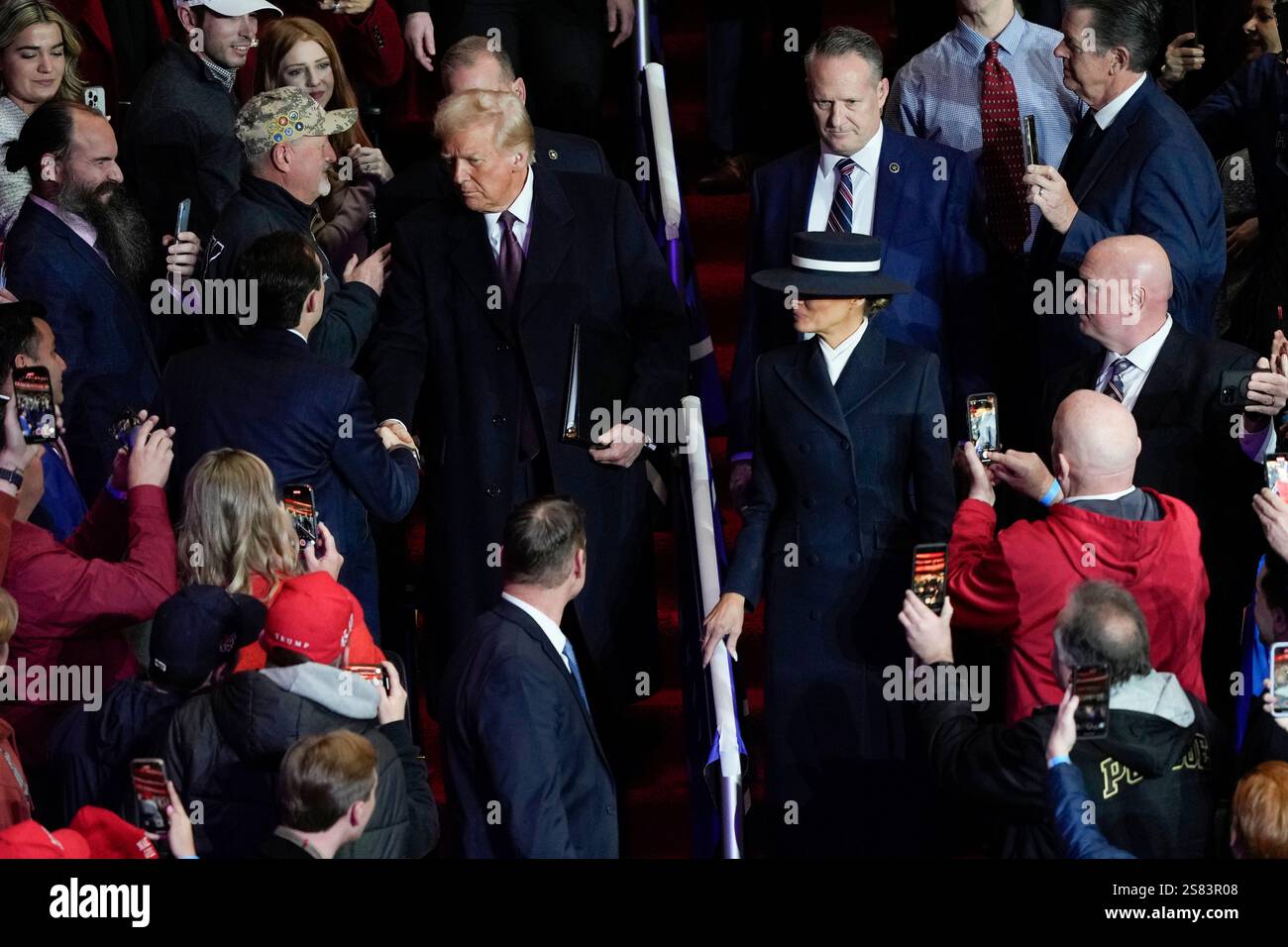 President Donald Trump and first lady Melania Trump, arrive at an ...
