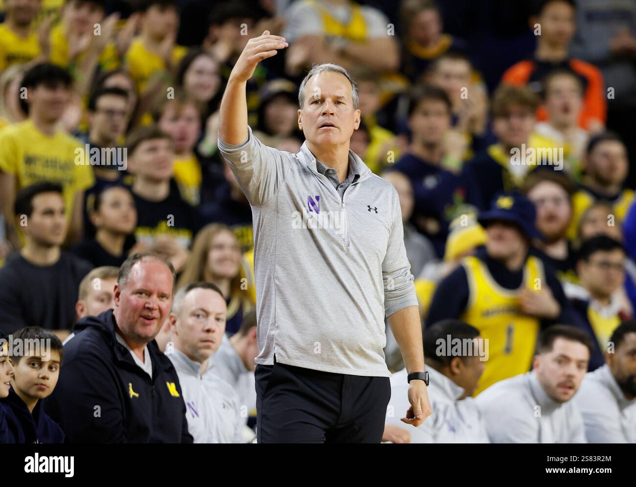 Northwestern head coach Chris Collins gestures to his team during the ...