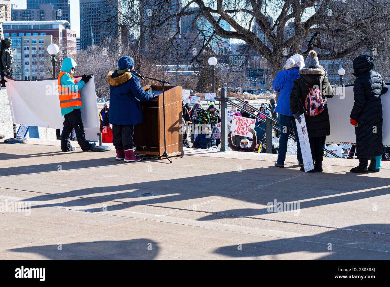 ST. PAUL, MN, USA - JANUARY 18, 2025: Speaker addresses crowd during ...