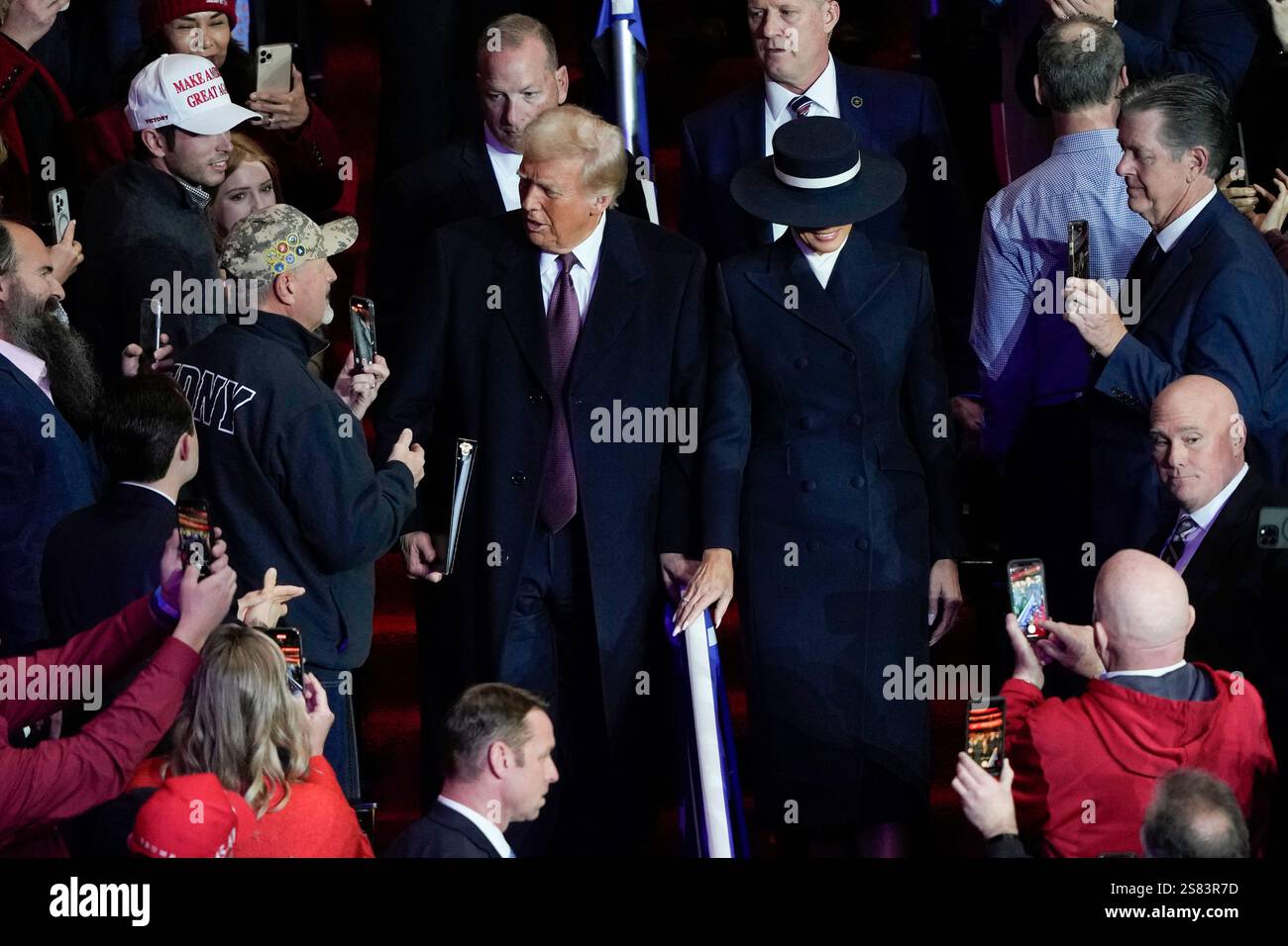 President Donald Trump and first lady Melania Trump, arrive at an ...