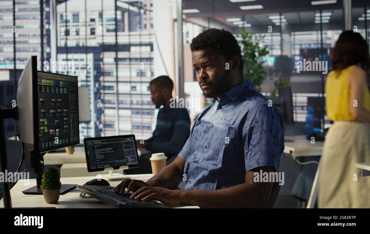 Man checking paperwork details on computer screen, solving tasks ...