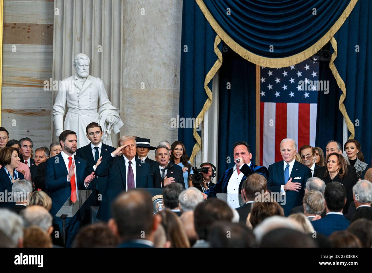 President Donald Trump listens to Christopher D. Macchio during the ...