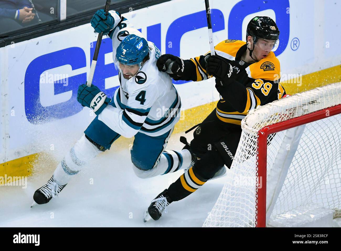San Jose Sharks defenseman Cody Ceci (4) and Boston Bruins center ...