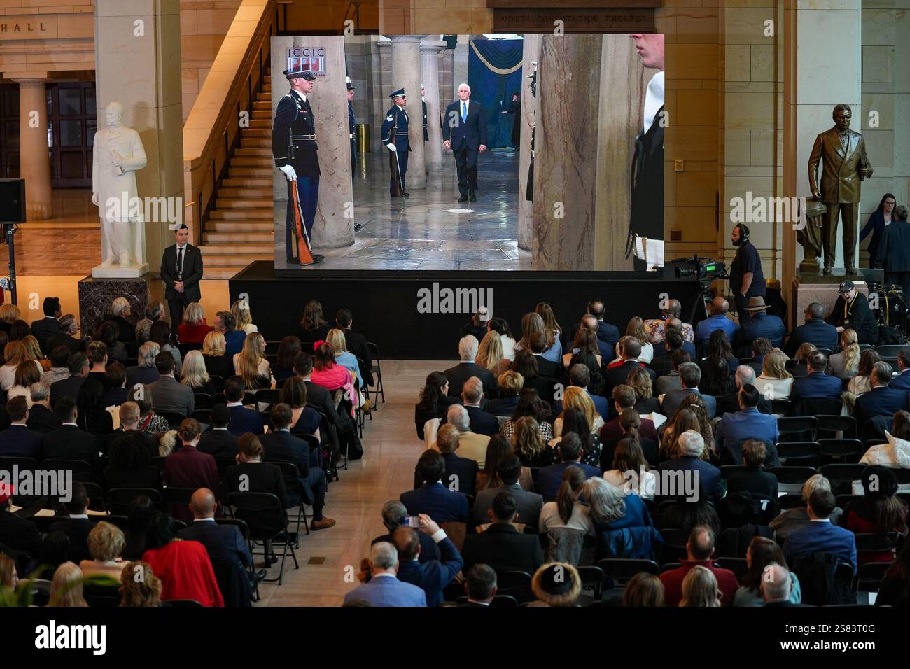 Washington, Dc, USA. 20th Jan, 2025. Attendees watch a livestream in Emancipation Hall showing ...