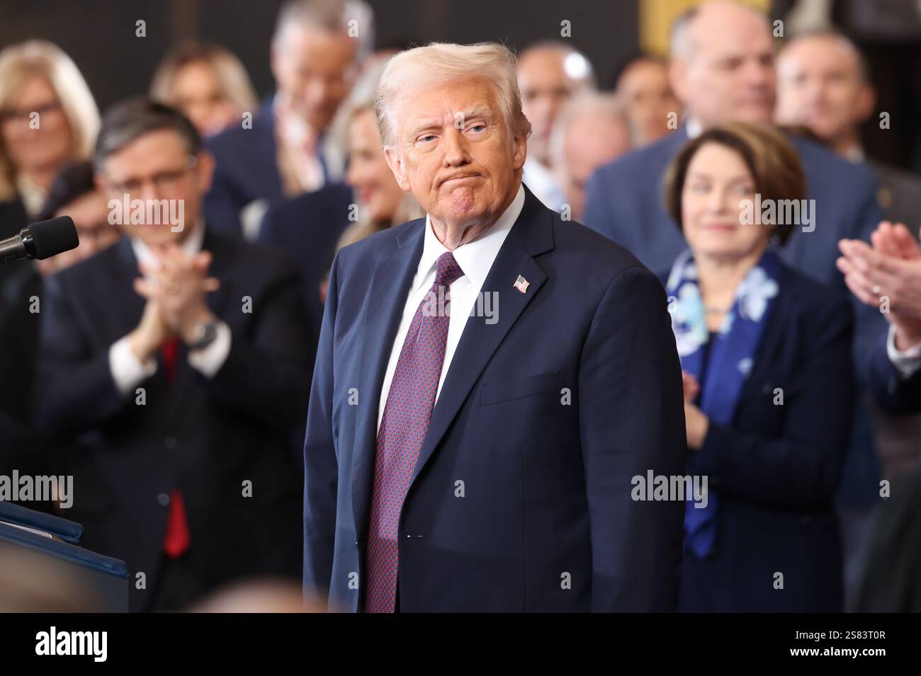 U.S. President Donald Trump is applauded after delivering his inaugural ...