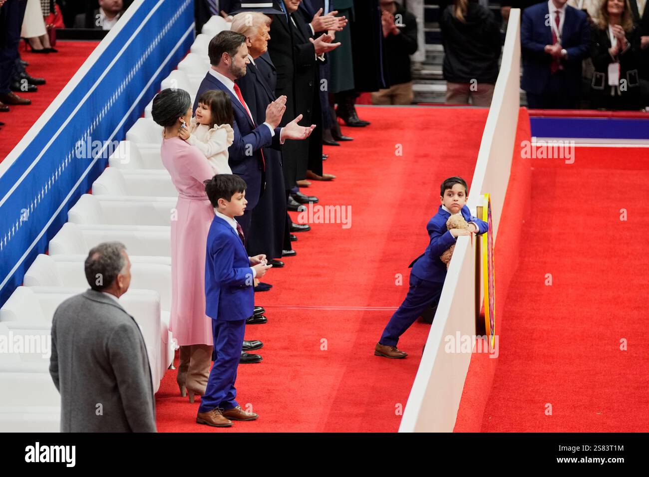 Second lady Usha Vance and Vice President JD Vance stand on stage with ...
