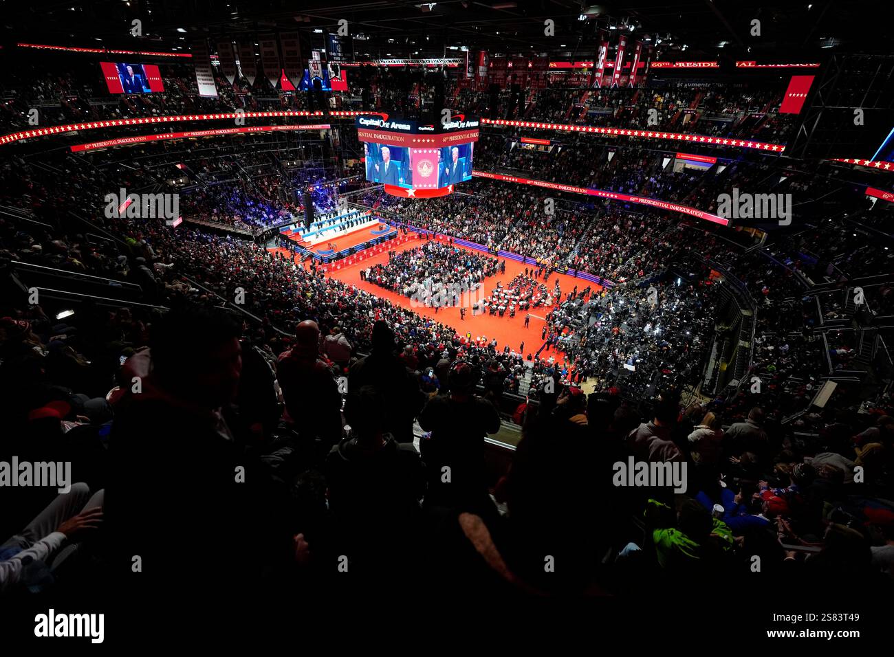 People gather inside Capital One Arena for an indoor Presidential ...