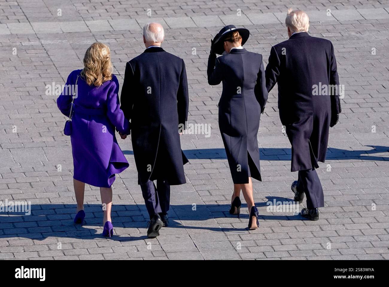 President Donald Trump, from right, and first lady Melania Trump walk ...