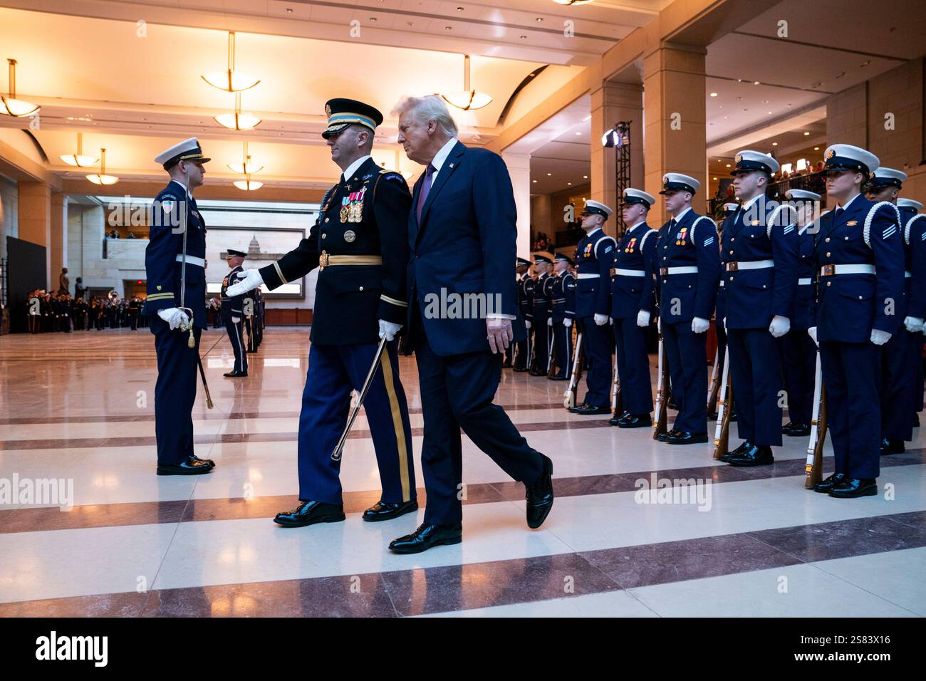 President Donald Trump reviews the troops in Emancipation Hall of the U ...