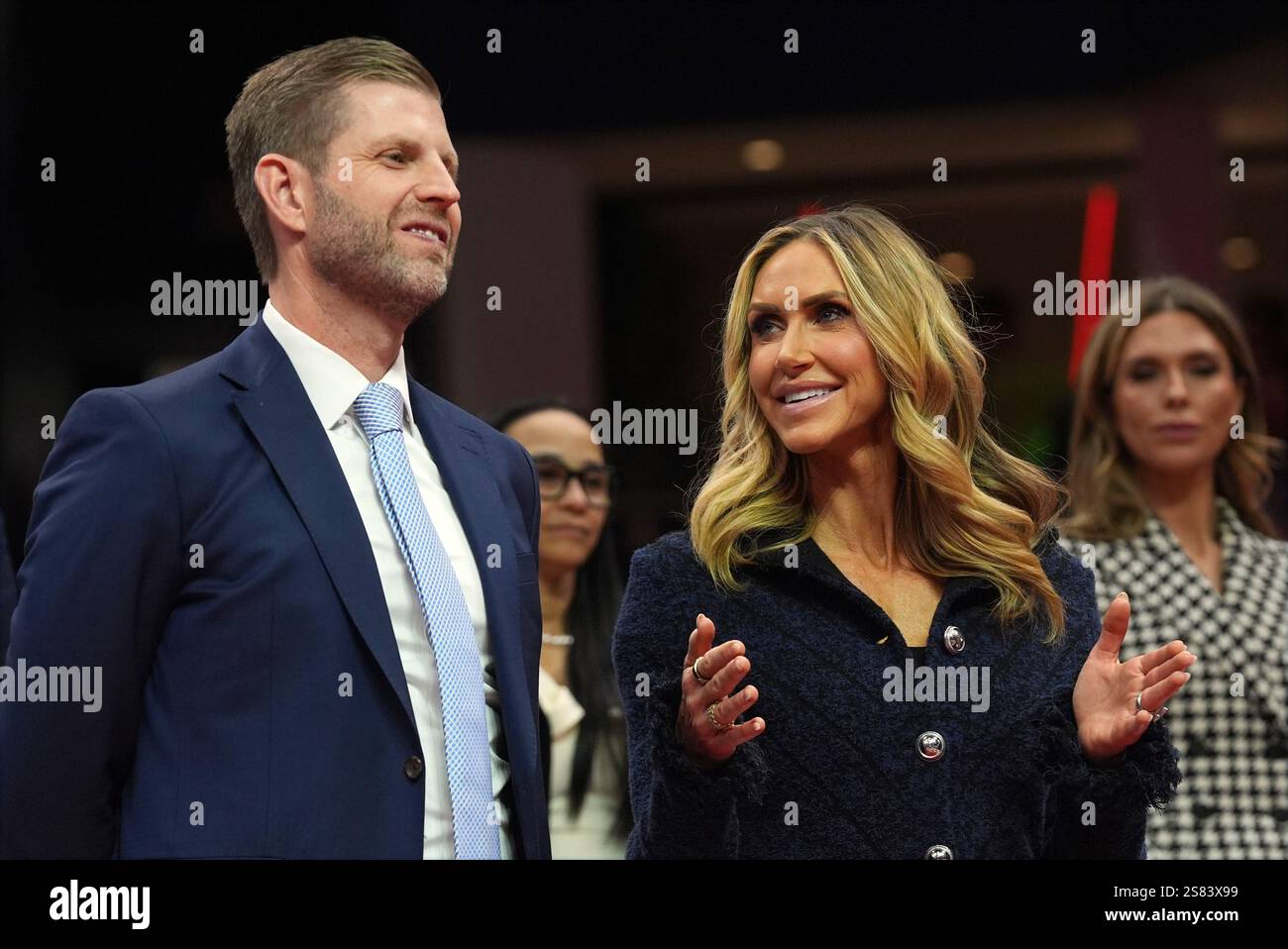 Eric and Lara Trump talks as President Donald Trump attends an indoor ...