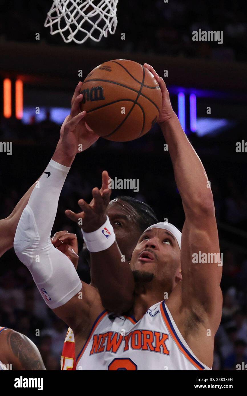 Atlanta Hawks' Clint Capela, back left, and New York Knicks' Josh Hart ...