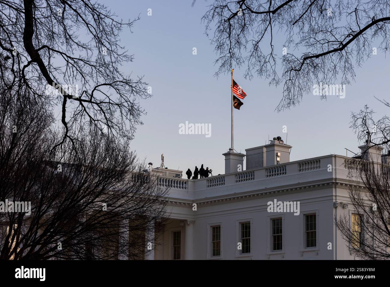 The flag over the White House flies at full-staff on the day of US President Donald Trump’s ...
