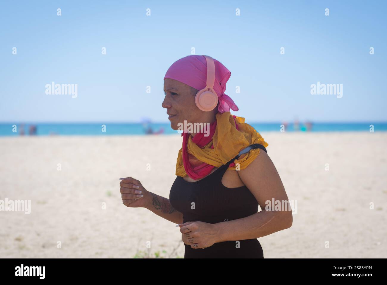 Cancer patient running with determination Stock Photo - Alamy