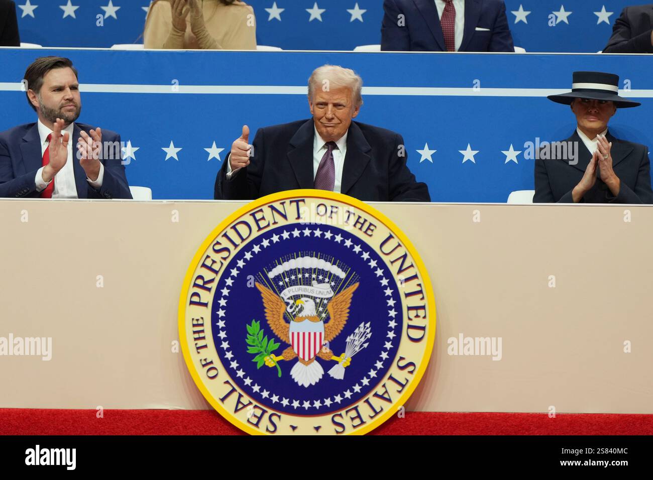President Donald Trump gives a thumbs up as Vice President JD Vance ...