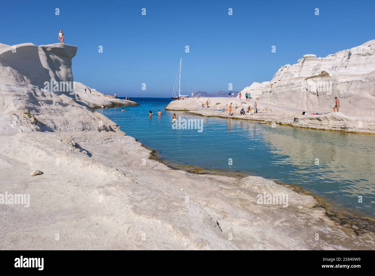 Milos, GR - 28 September 2024: People sunbathing Sarakiniko beach Stock ...