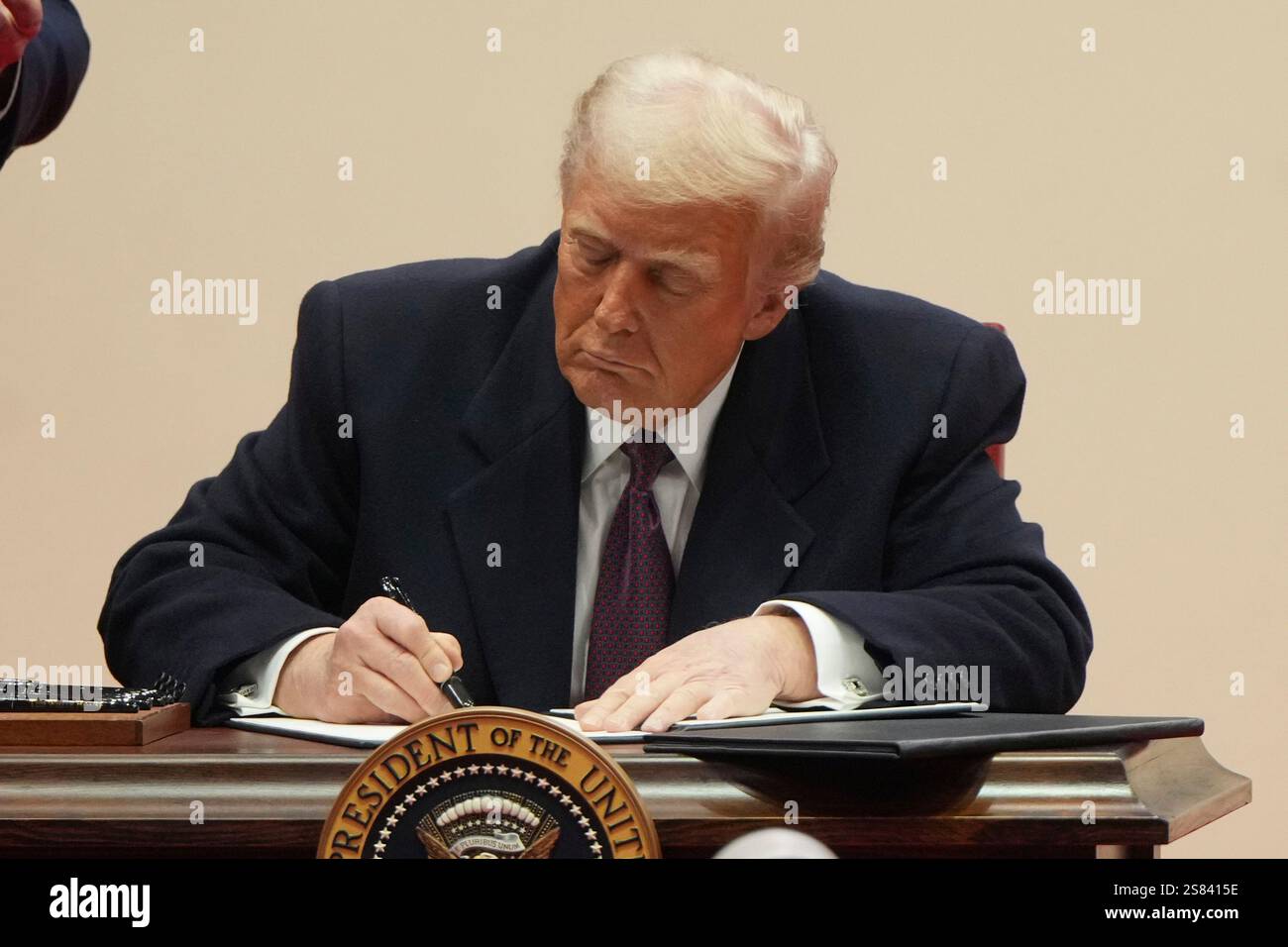 President Donald Trump signs executive orders an indoor Presidential ...