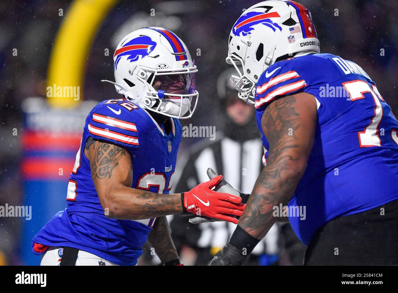 Buffalo Bills running back Ray Davis, left, celebrates with tackle Dion ...