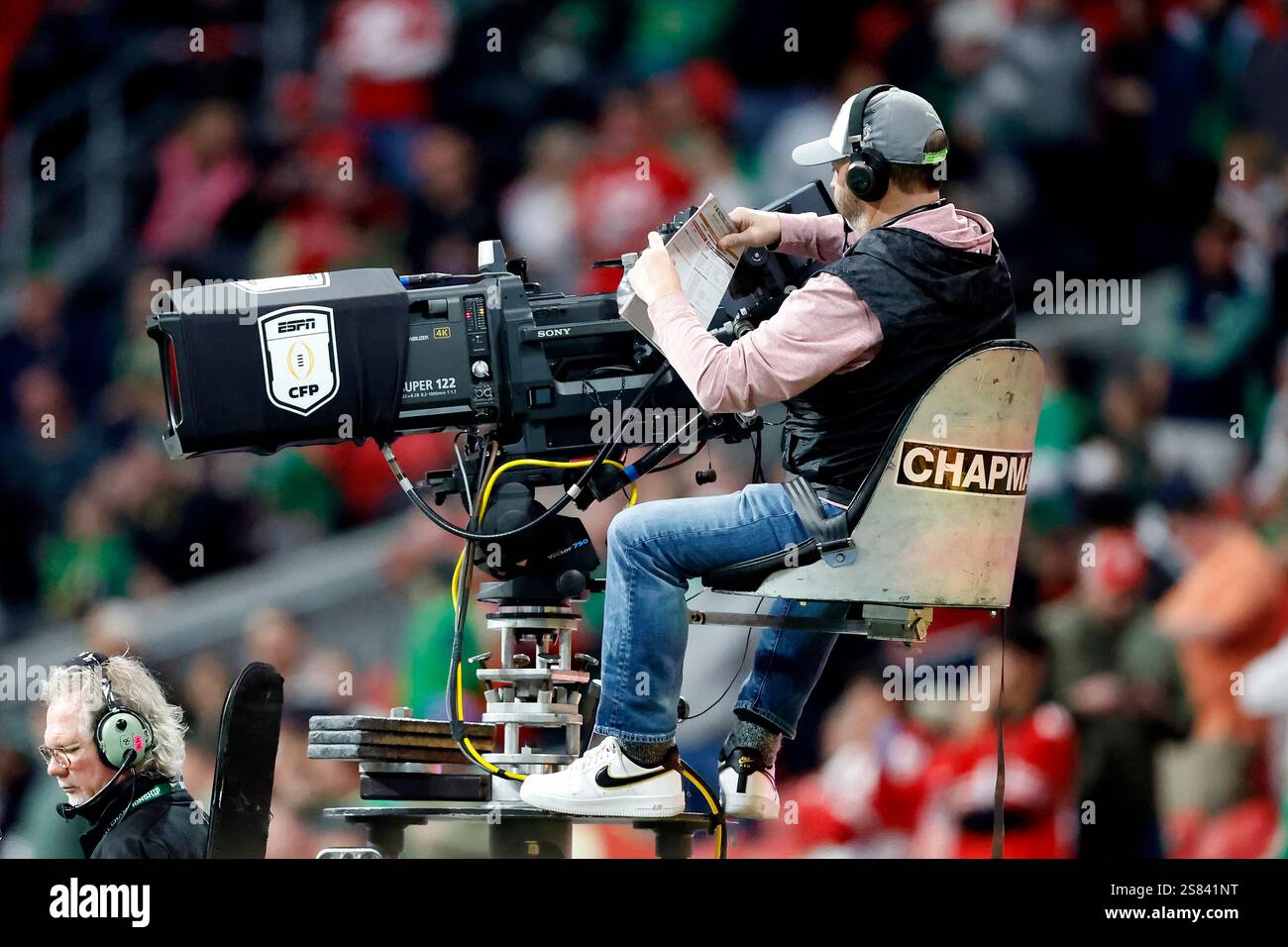 ATLANTA, GA - JANUARY 20: An ESPN camera operator captures the action ...