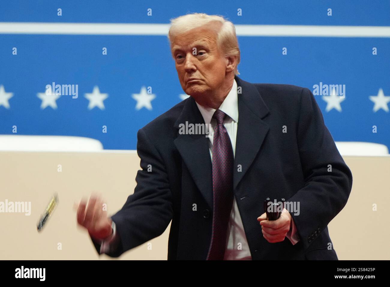 President Donald Trump throws pens used to sign executive orders to the ...