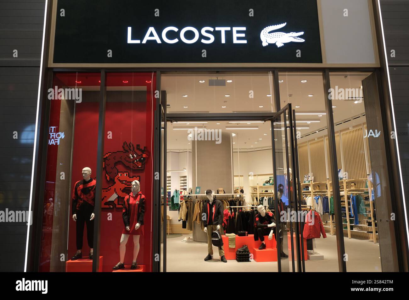 LACOSTE clothing store facade Stock Photo - Alamy