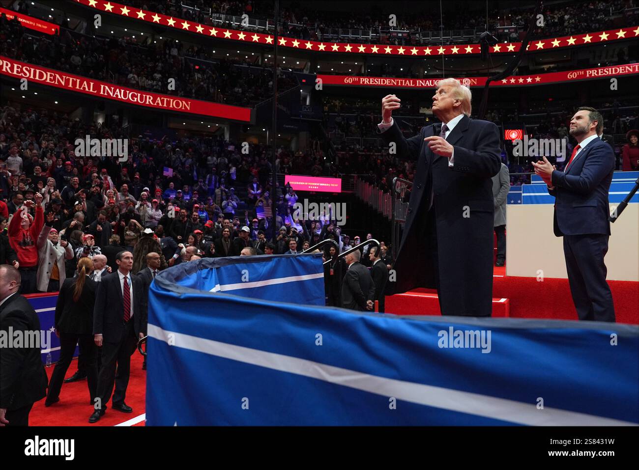 President Donald Trump throws a pen after signing executive orders as ...