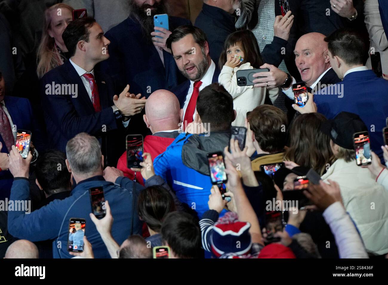 Vice President JD Vance, holding his daughter Mirabel, arrives at an ...