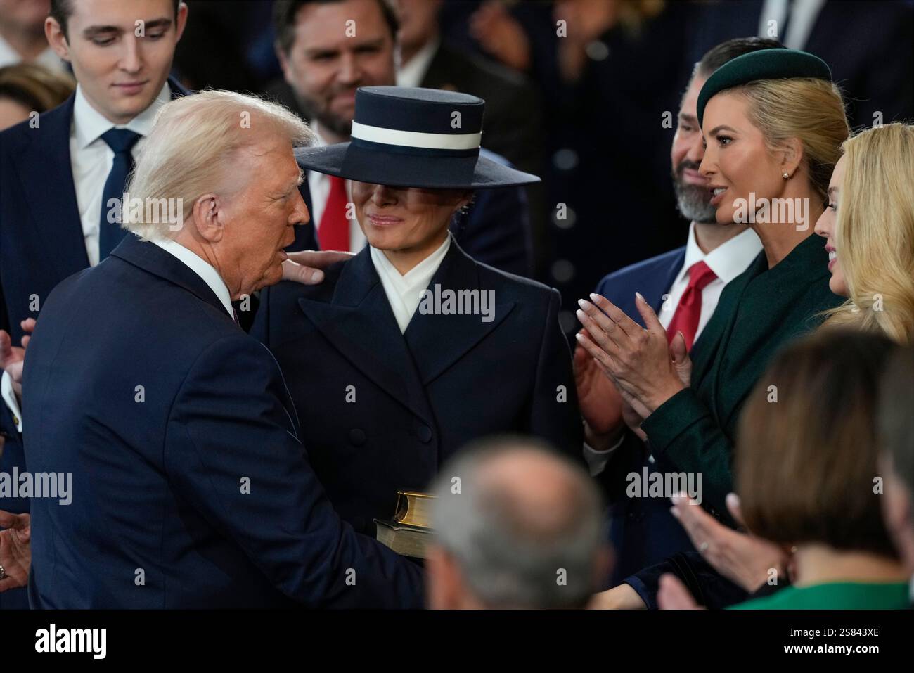 Washington, Dc, USA. 20th Jan, 2025. President Donald Trump hugs first ...