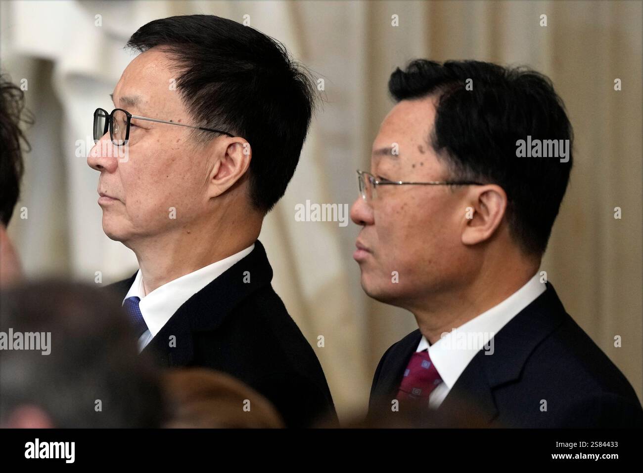 China's Vice President Han Zheng stands with Xie Feng, China's ...