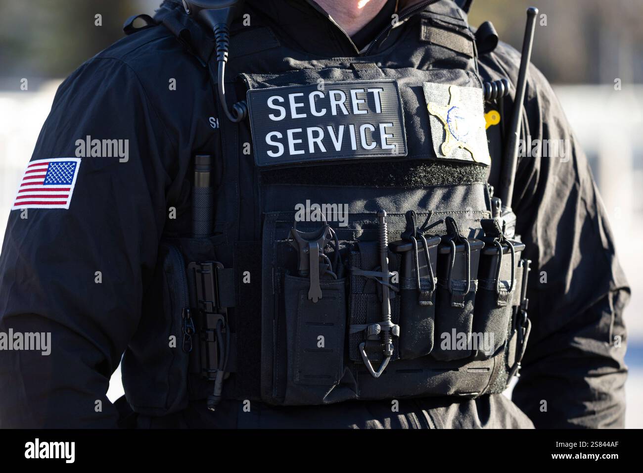 A U.S. Secret Service agent guards the U.S. Capitol during the ...